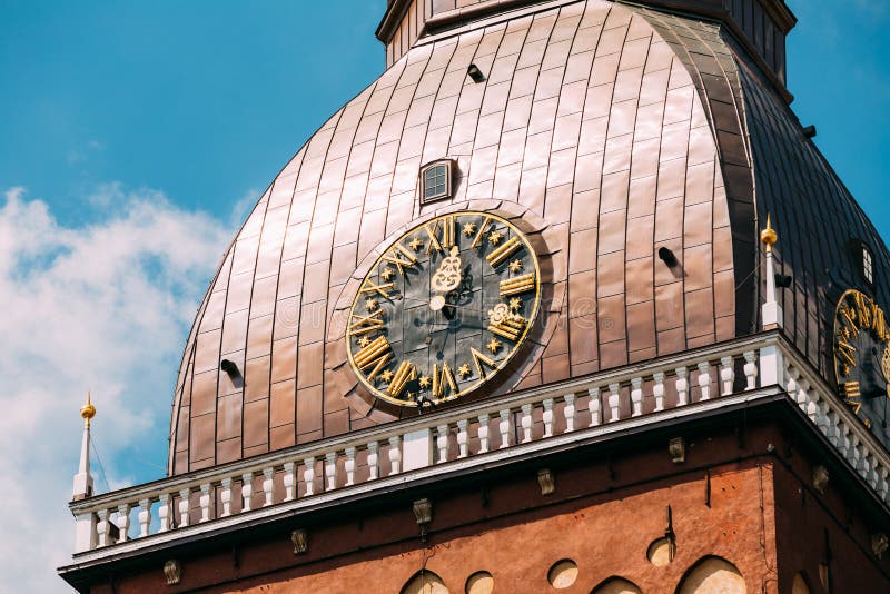 Clock on Tower of Riga Dome Cathedral in Riga, Latvia. Sunny Sunset ...
