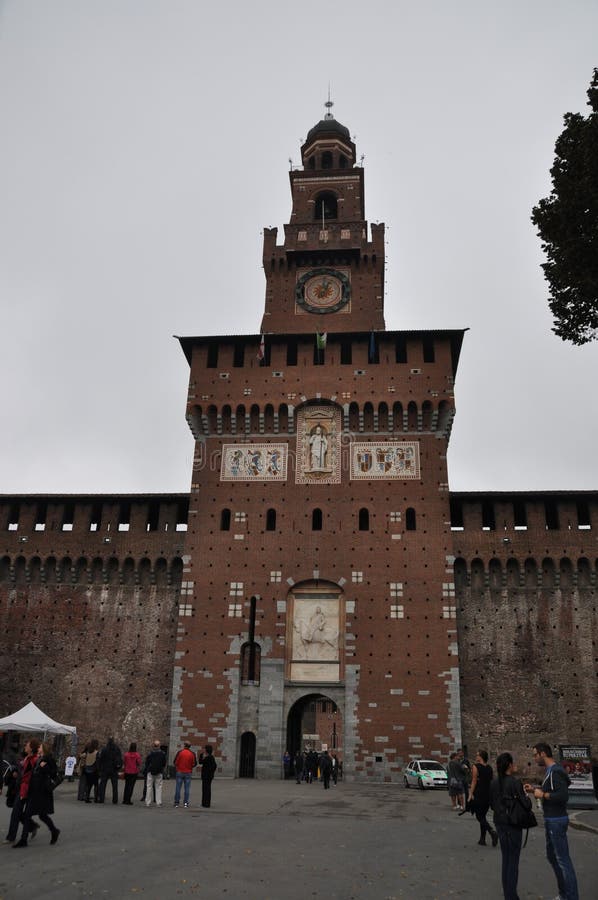The Clock Tower of the Sforza Castle. People in Front of the Tower ...