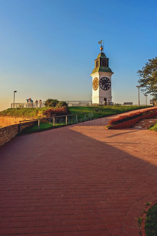 Clock tower at sunset stock photo. Image of life, retro - 74911578