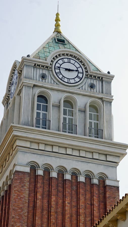 Clock tower at sunset town stock photo. Image of asia - 316341854