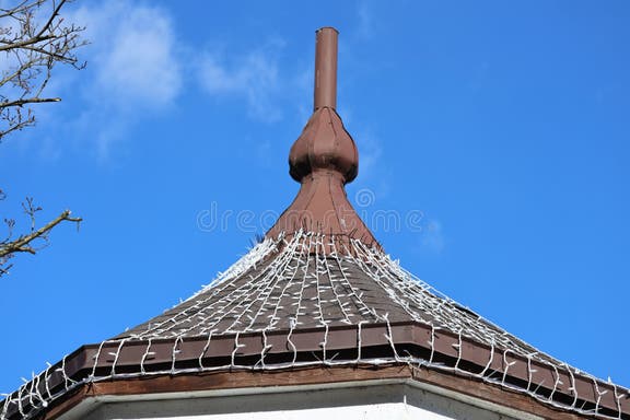 A Clock Tower at the Top of a Building with a Prominent Clock Face ...