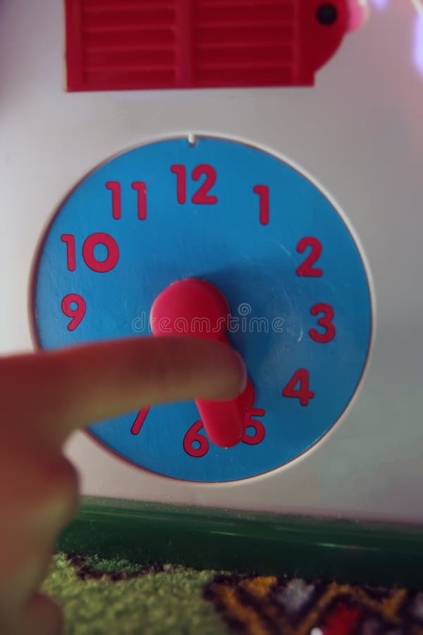 Clock Toy. Child Clock Toy. Stock Photo - Image of human, hand: 100749064