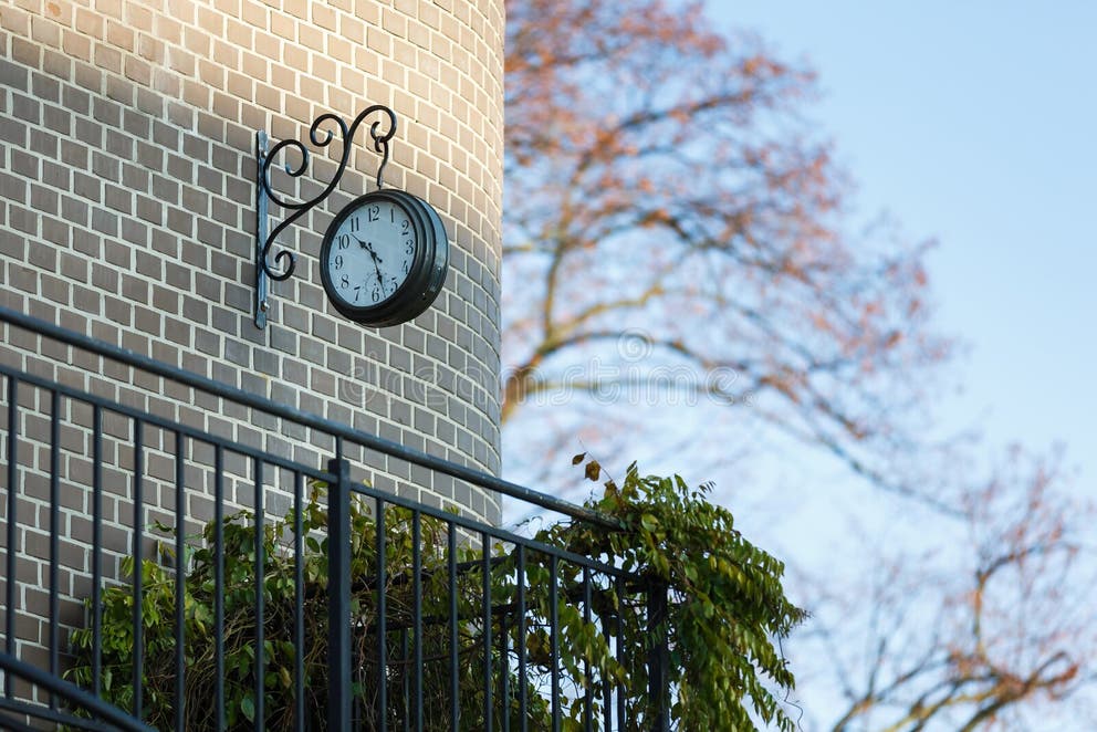 Clock on the wall stock photo. Image of fall, outdoor - 63121308