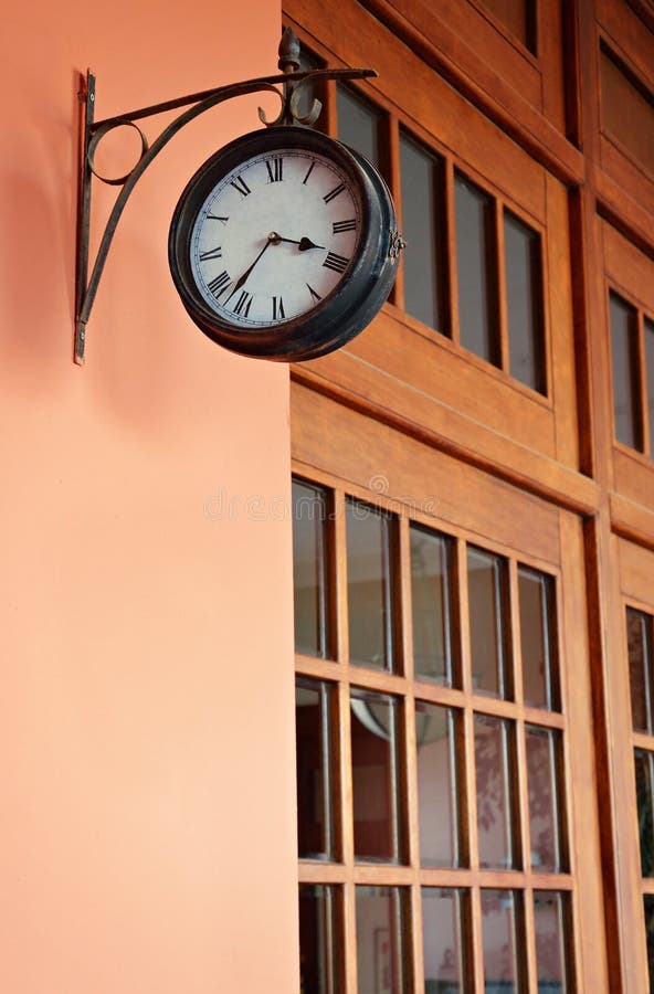 Clock on the Wall of a Building Stock Photo - Image of beige ...