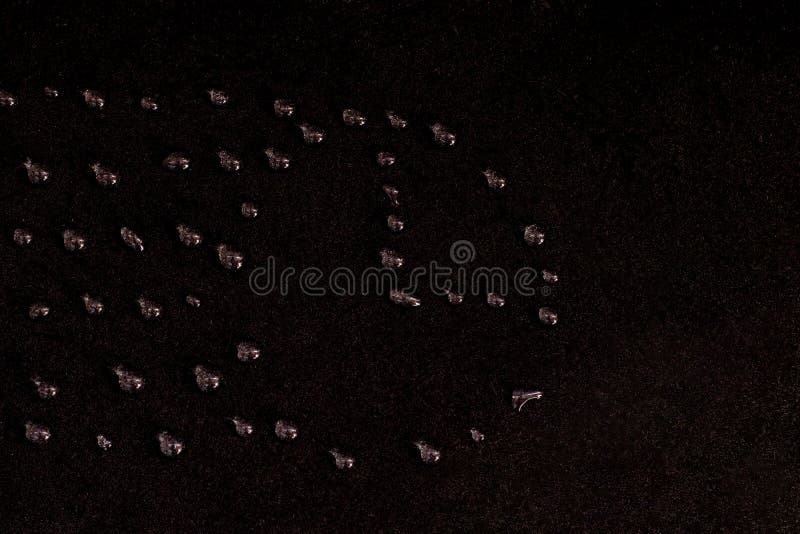 Clock from Water Drops on a Black Background. the Concept of the ...