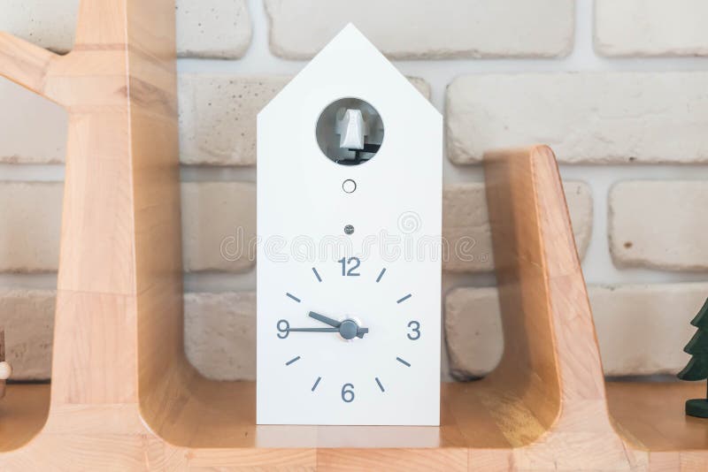 Clock on wood shelf stock image. Image of home, modern - 97340835