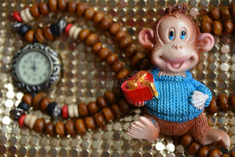 Clock with Wooden Beads and Decorative Monkey Stock Image - Image of ...
