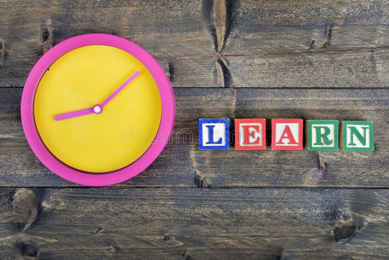 Clock and word Learn stock photo. Image of letters, development - 75086630