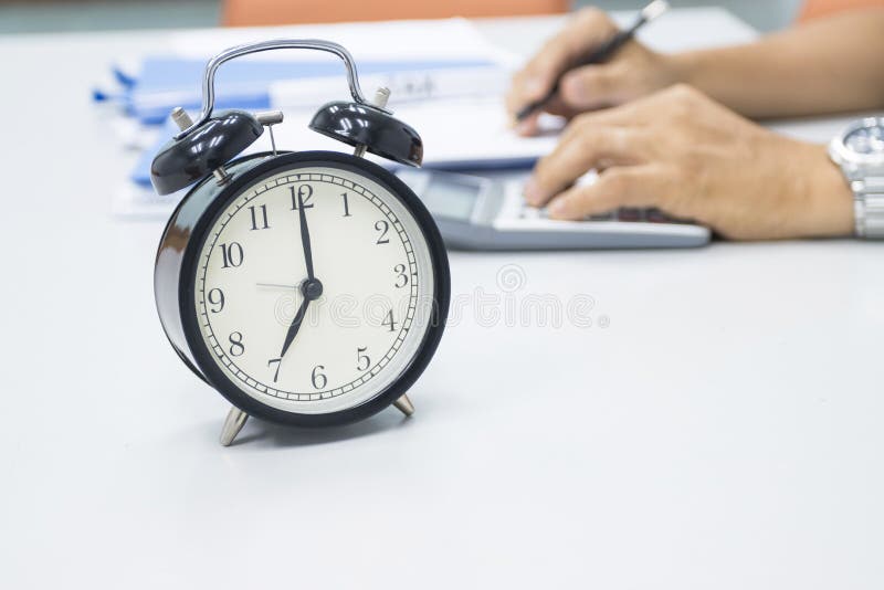 7 am Clock on Work Desk in the Office Time of Businessman Working Stock ...