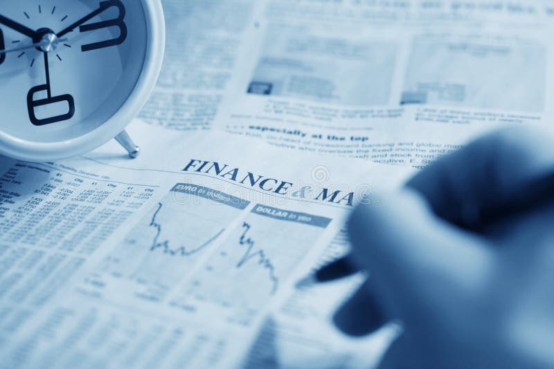 Clock and pen on newspaper stock image. Image of finance - 7597367
