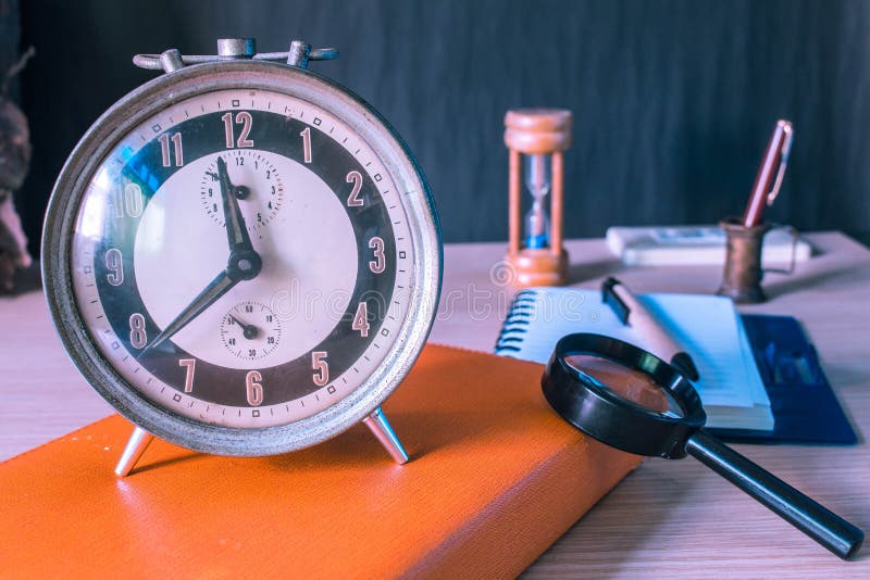 Clock and Writing on a Wooden Stock Image - Image of vintage, office ...