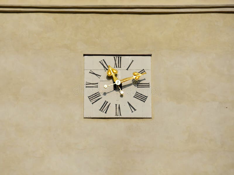 Clock on a Yellow Building Wall Outdoors Stock Photo - Image of clock ...
