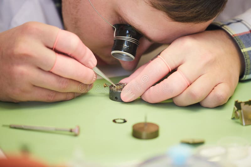 Clockmaker Fixing Watch stock photo. Image of disassembling - 143550240