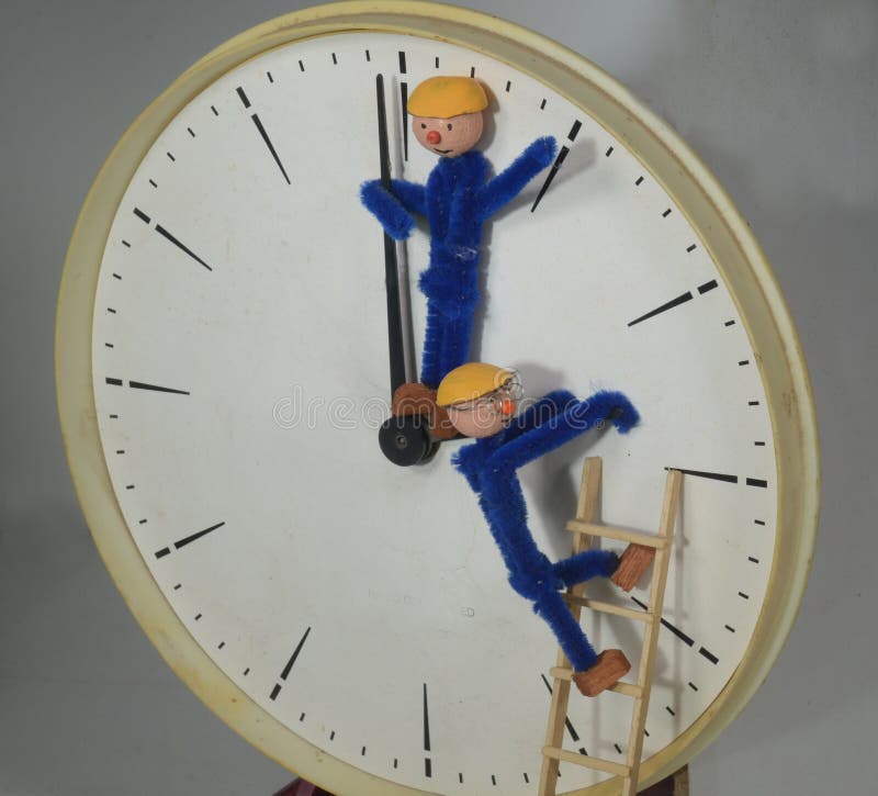 Clockmen Adjusting a Clock To or Back from Daylight Saving Time Stock ...