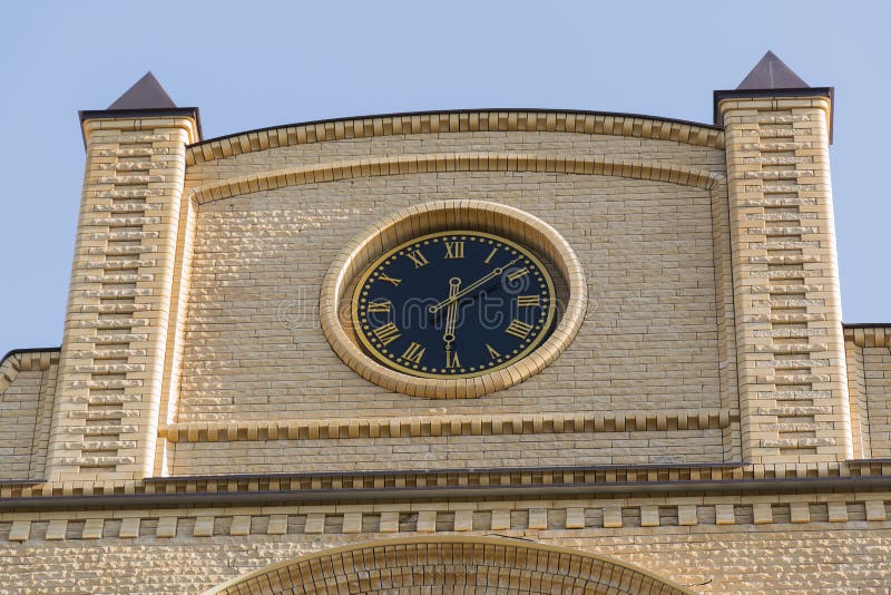 Clocks on the Building of Yellow Brick Stock Image - Image of time ...