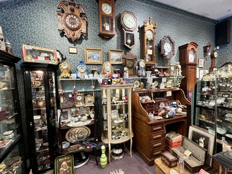 A Multitude of Antique Clocks Keep Time in an Antique Store in July ...