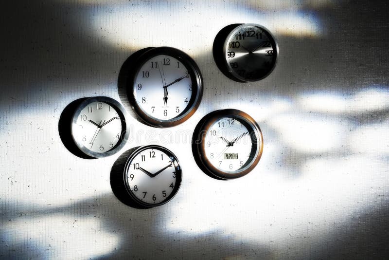 Five Clocks Of Different Times Stock Image - Image of deadline, night ...