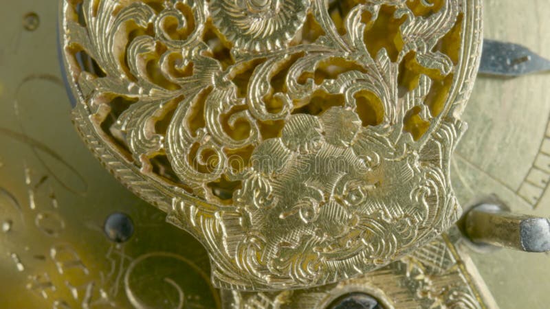 Clockwork Mechanism Macro. Round Wheel with a Carved Pattern from ...