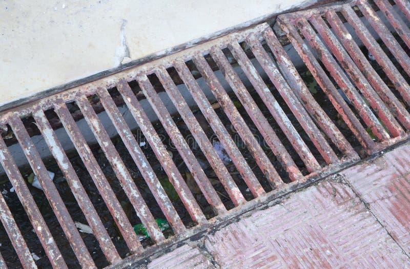 Clogged up street drain stock photo. Image of europe - 58672778