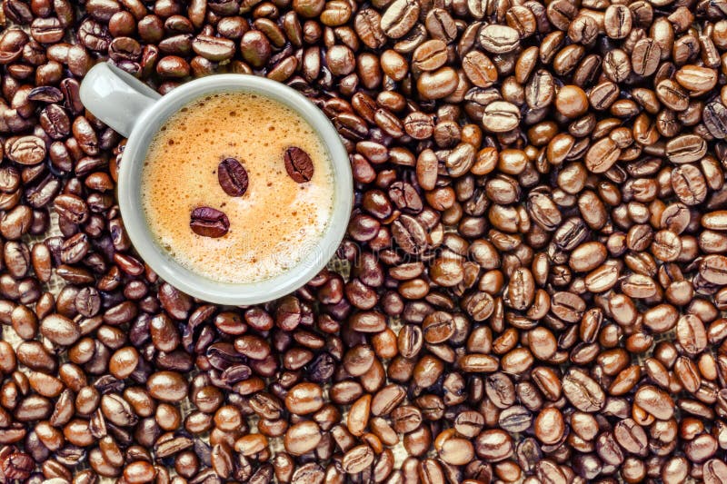 Coffee Cup Placed on a Bed of Coffee Beans Stock Image - Image of ...