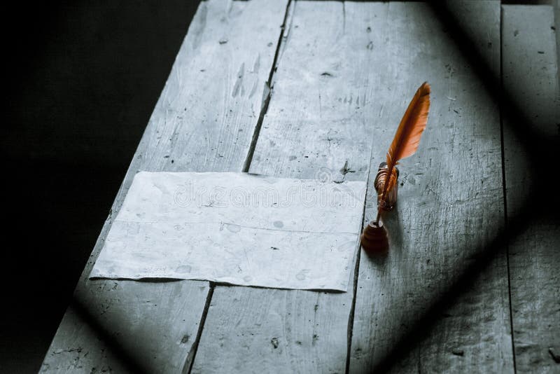 Cloister Cell with Pen and Sheet on a Table in a Dark Room - Concept ...
