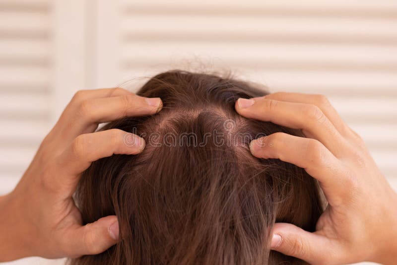 Clos Eup View of Unrecognizable Young Man with Long Hair Massaging the ...