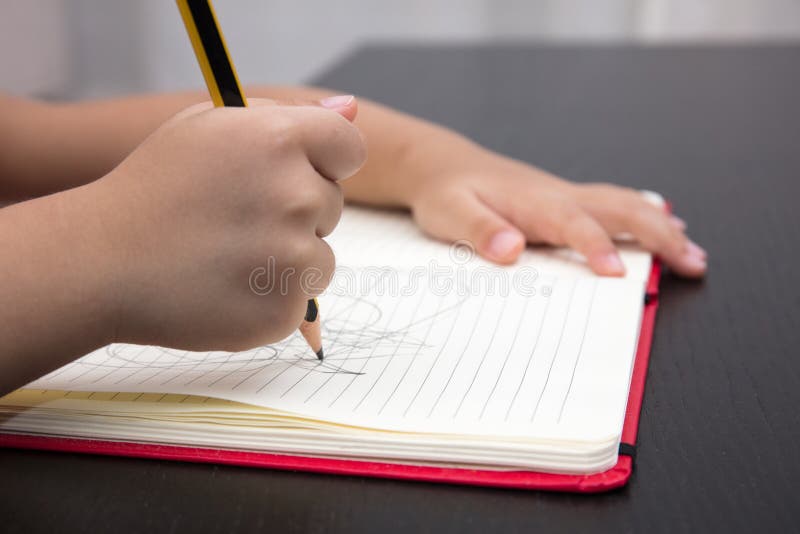 Close of Children Hands Writing on Excercise Book Stock Photo - Image ...