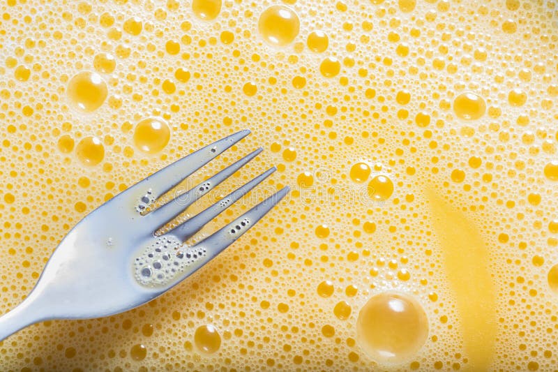 Close Detail of a Fork with Bubbles on Omelette Stock Image - Image of ...