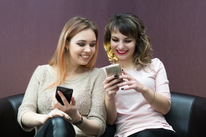 Close Friends Sit on the Couch Talking Stock Image - Image of mobile ...