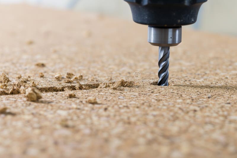 Close Image of Drilling into Corkboard, Cork Pieces Visible Stock Image ...