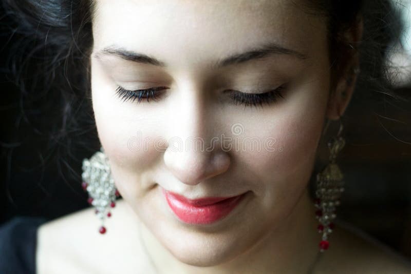 Close Portrait of Young Woman Looking Down Stock Photo - Image of ...