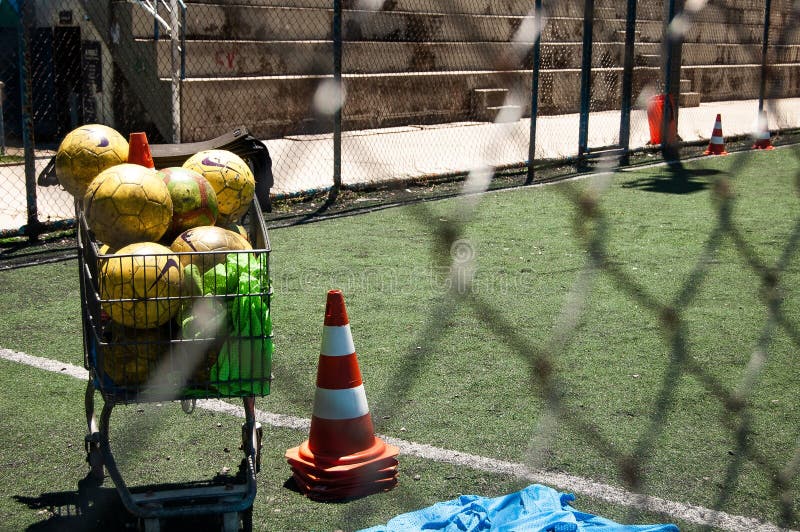 Close Range Shot of a Blurred Fence and Footballs and Obstacles in the ...