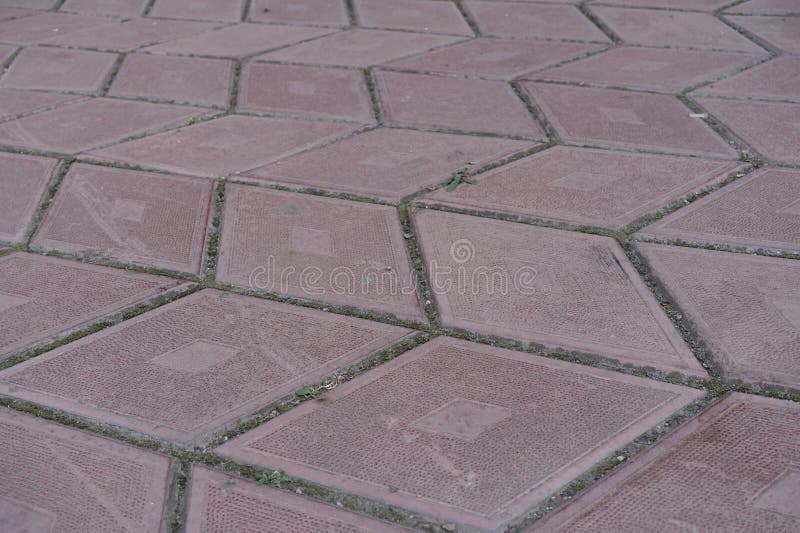 Close Shot of Grayish Pink Diamond-shaped Concrete Pavement with ...