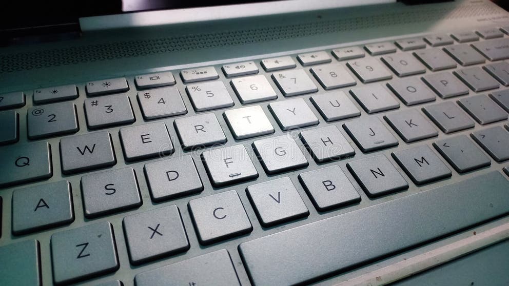 Silver laptop keyboard stock photo. Image of office - 210515748