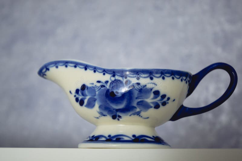 Various Dishes Painted in the Style of Gzhel Stock Photo - Image of ...