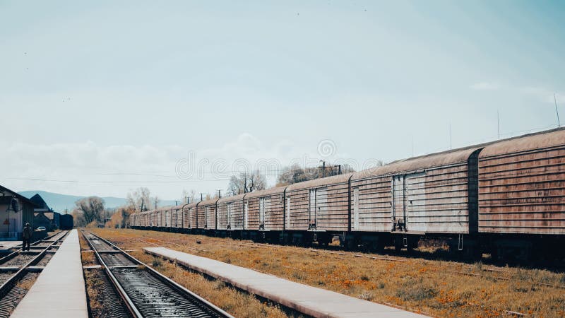 Close Up of Abandoned Freight Train on an Old Railway Station Platform ...