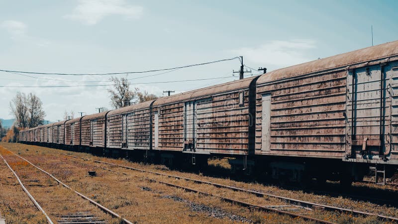 Close Up of Abandoned Freight Train on an Old Railway Station Platform ...