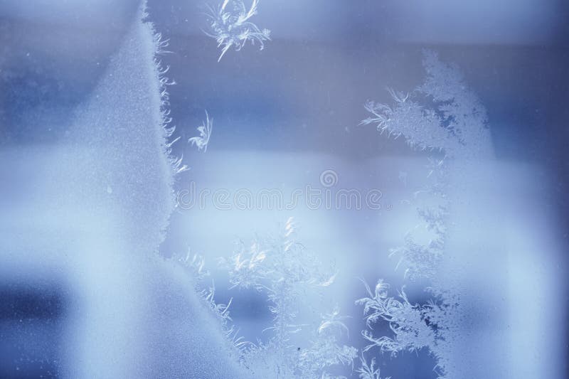 Close Up of an Abstract Blurred Freezing Patterns on the Glass Window ...