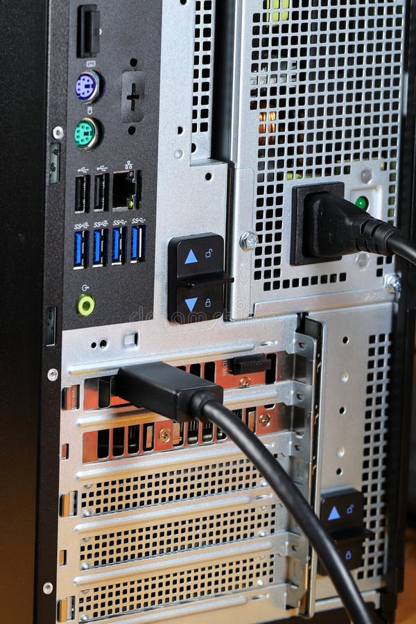 Close Up of AC Power and Display Port Cable Plugged into the Back of ...
