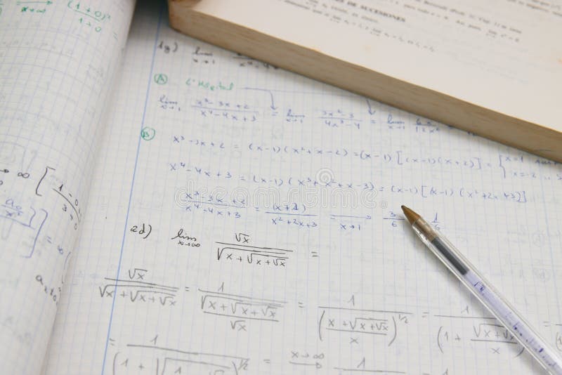 Close-up of Advanced Math Homework Next To a Student S Pen and Book ...