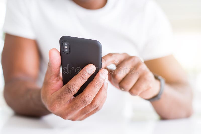 Close Up of African American Man Hands Using Smartphone Stock Photo ...