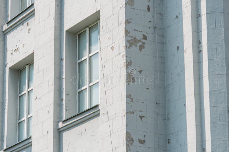 Close-up of Aged, Light-toned City Building Facade with Vertical Lines ...