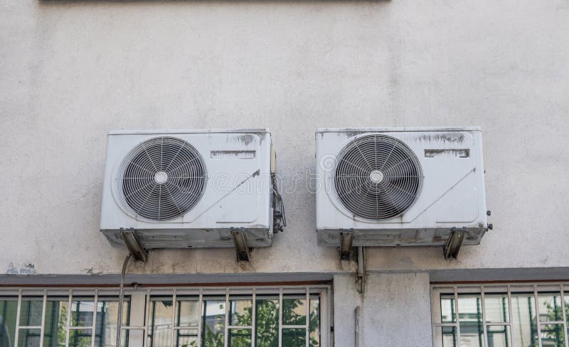 Close-up of the Air Conditioners Attached To the Building. the ...