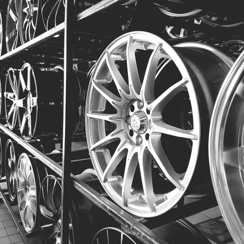 Close Up of Alloy Wheels on Shelves Stock Image - Image of autoparts ...