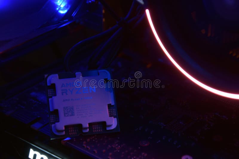 Close-up of an AMD Ryzen 9 7900X Processor, Against the Backdrop of ...
