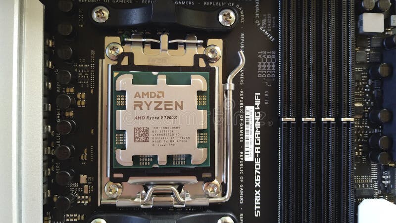 Close-up of an AMD Ryzen 9 3900X Processor Installed on a Motherboard ...