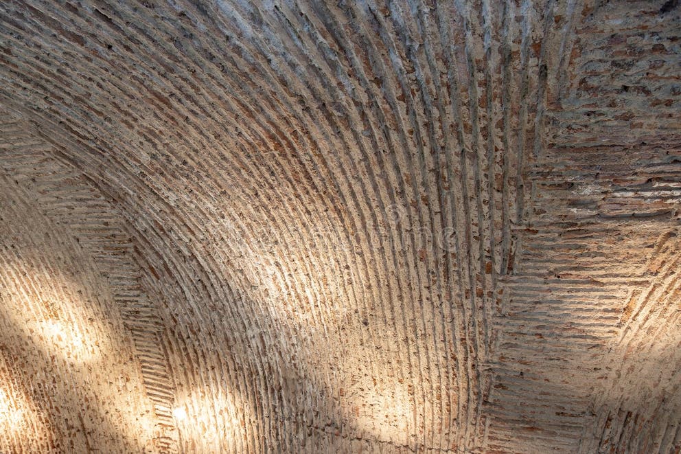 Close-up of an Ancient Arched Ceiling with Rough, Textured Brick and ...
