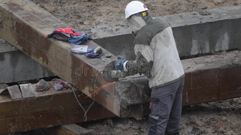 Angular Saw Grinding through Construction Piles at Construction Site ...