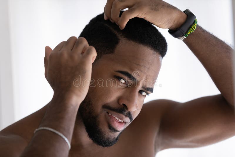 Close Up Anxious African American Man Touching Head, Checking Hair ... Close Up Anxious African American Man Touching Head, Checking Hair ...