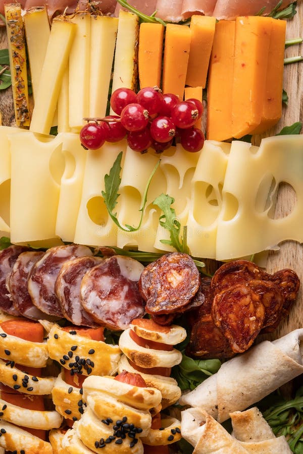 Close Up on Appetizer Food on the Table Cheese and Sausage Rolls Full ...